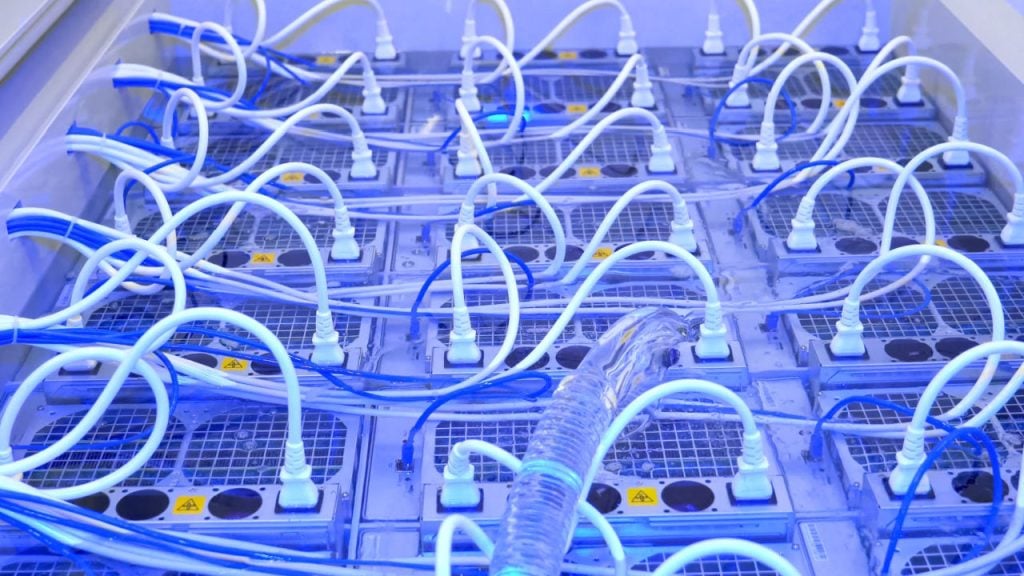 Large Immersion Cooled Crypto Mining Farms to Extract Bitcoin in Middle ...